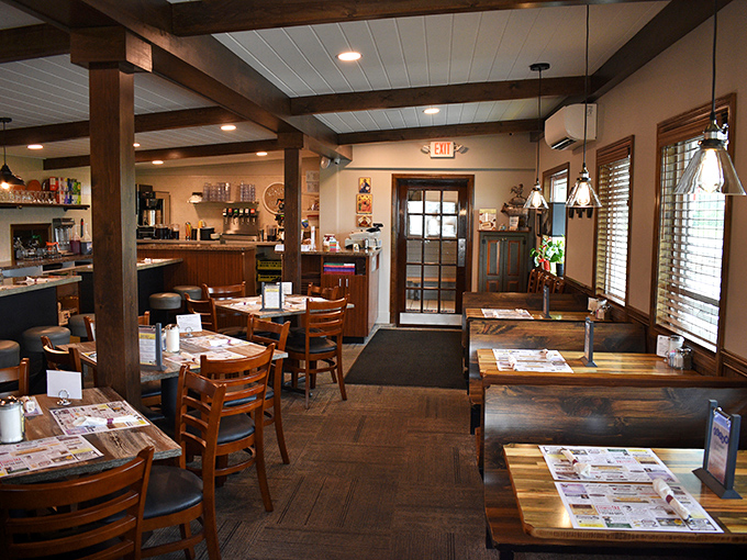 Wooden beams, warm lighting, and tables set for hungry patrons&mdash;this isn't interior design, it's a hug in restaurant form.