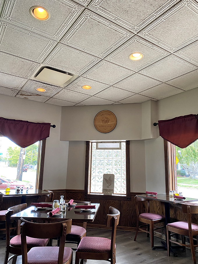 Step inside and feel the warmth of old-school Italian hospitality wrapped in burgundy and wood.