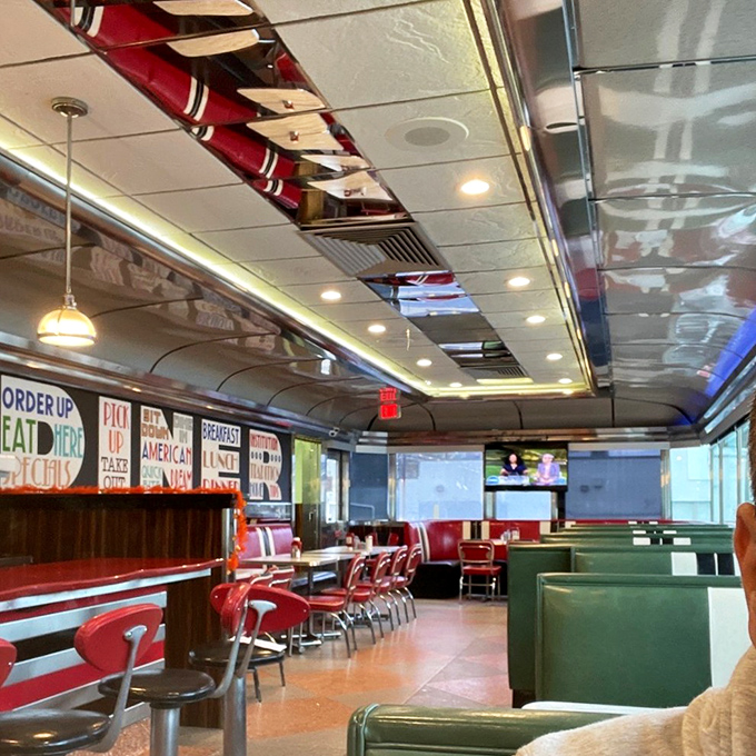 Red vinyl booths and classic diner charm await inside. It's like sliding into a Norman Rockwell painting where calories don't count and coffee never gets cold.