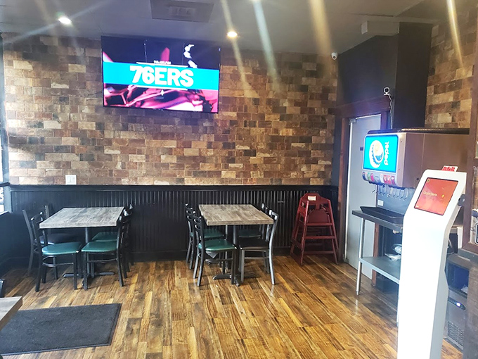 Simple tables, stone walls, and a TV showing the game&mdash;this is where food matters more than frills.