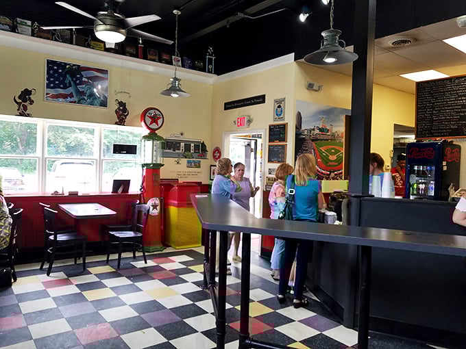 Step inside to a nostalgic wonderland where the checkered floor and vintage decor transport you to simpler times when comfort food reigned supreme.