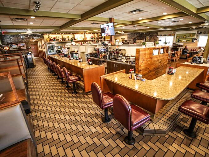 The counter seating offers front-row tickets to the breakfast show, where regulars exchange knowing nods about the hollandaise.