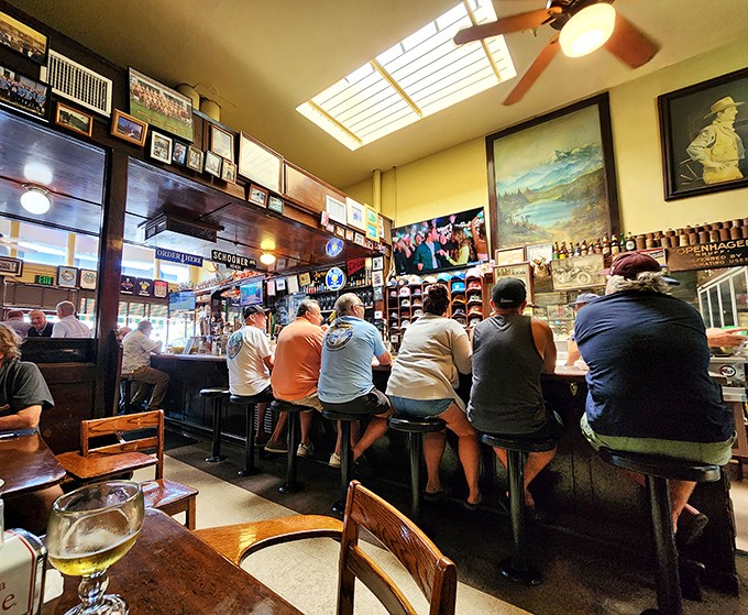 The heart of Joe Jost's beats at this well-worn bar, where regulars perch on stools that have supported generations of beer lovers and sandwich enthusiasts.
