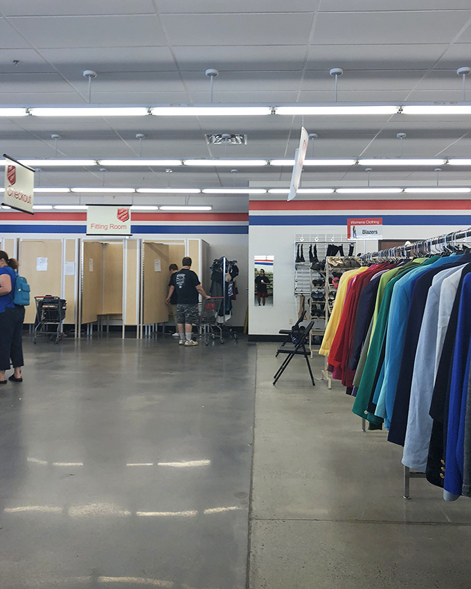 The fitting room area beckons with possibilities. Here's where fashion dreams are reborn and wallets breathe sighs of relief.