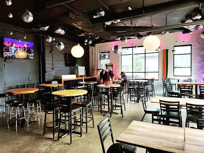 Disco balls and industrial chic create the perfect backdrop for pizza indulgence. This isn't just dining&mdash;it's dinner with a side of atmosphere.