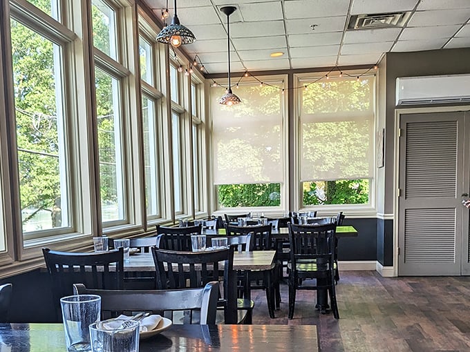 Sunlight streams through floor-to-ceiling windows, creating the perfect backdrop for both intimate conversations and the upcoming food drama about to unfold.