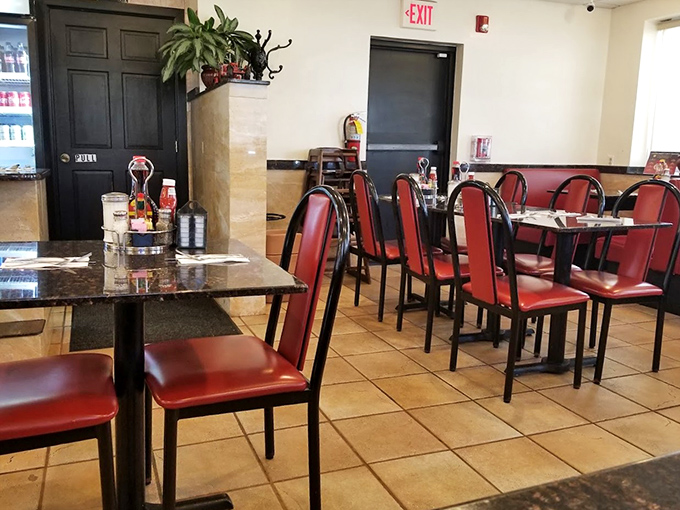 Classic red vinyl chairs and spotless tables create that timeless diner atmosphere where comfort isn't just on the menu—it's built into every corner.
