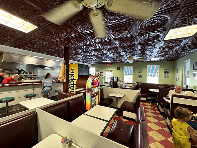 Step inside and time slows down under that gorgeous tin ceiling. The vintage jukebox stands ready &ndash; because every perfect breakfast deserves its own soundtrack.