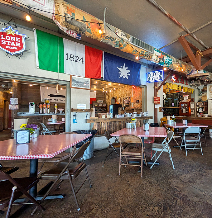 Inside, flags tell the story of Texas heritage while red-checkered tablecloths signal you're in for some serious comfort food.