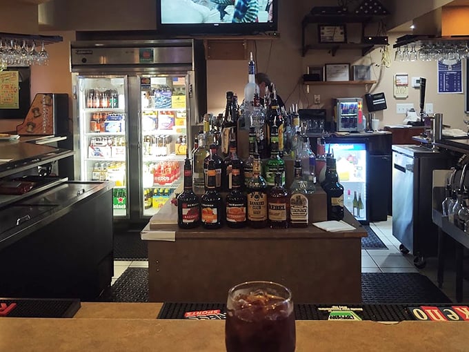 The bar gleams with promise, a liquid library of possibilities where friendly conversations flow as freely as the drinks.