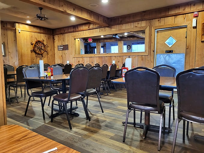 Wooden paneling and nautical touches create that perfect "somewhere-far-from-the-ocean" seafood joint vibe that somehow makes the crab taste even better.