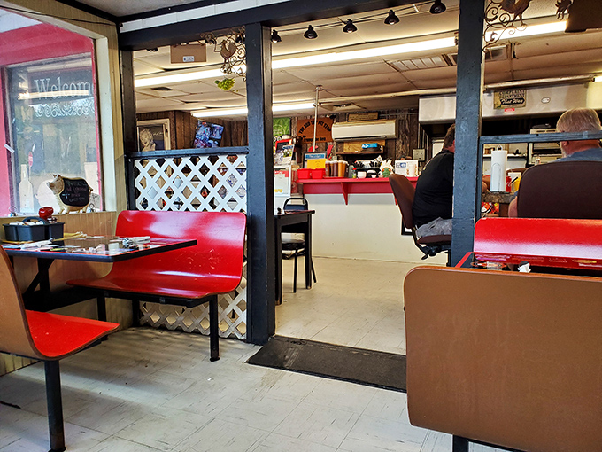 Red booths and lattice dividers create that perfect "no-frills, all-thrills" atmosphere where the only thing that matters is what's on your plate.
