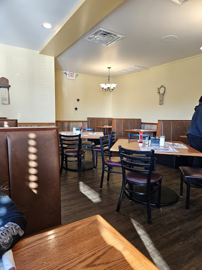 Inside, the warm wood paneling and comfortable booths create that perfect "everybody knows your name" atmosphere without the complicated bar tab.