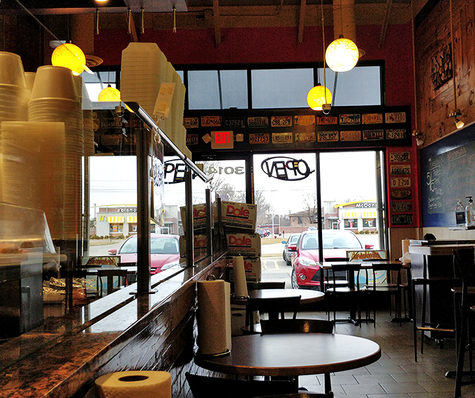 Simple tables, pendant lights, and the promise of smoky delights. This no-frills interior lets you know you're here for serious eating, not Instagram posing.