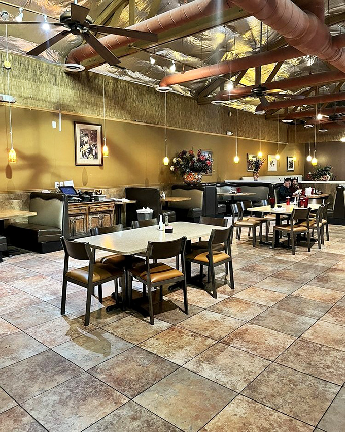 Exposed wooden beams and warm earth tones create the perfect backdrop for the food drama about to unfold on your table.