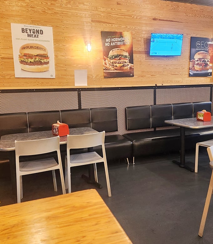 Clean lines and warm wood create the perfect backdrop for serious burger contemplation and family conversations.