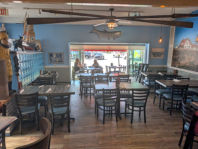 Inside, nautical dreams come to life with blue walls, wooden accents, and maritime decor. It's like dining in a sea captain's living room&mdash;if that captain had excellent taste.