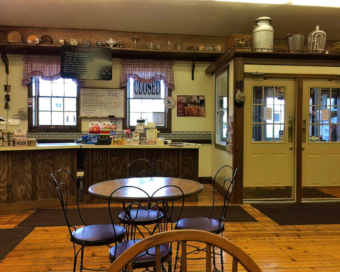 Inside, wooden floors that have witnessed countless sugar-fueled pilgrimages creak beneath your feet while vintage farm implements watch from above.