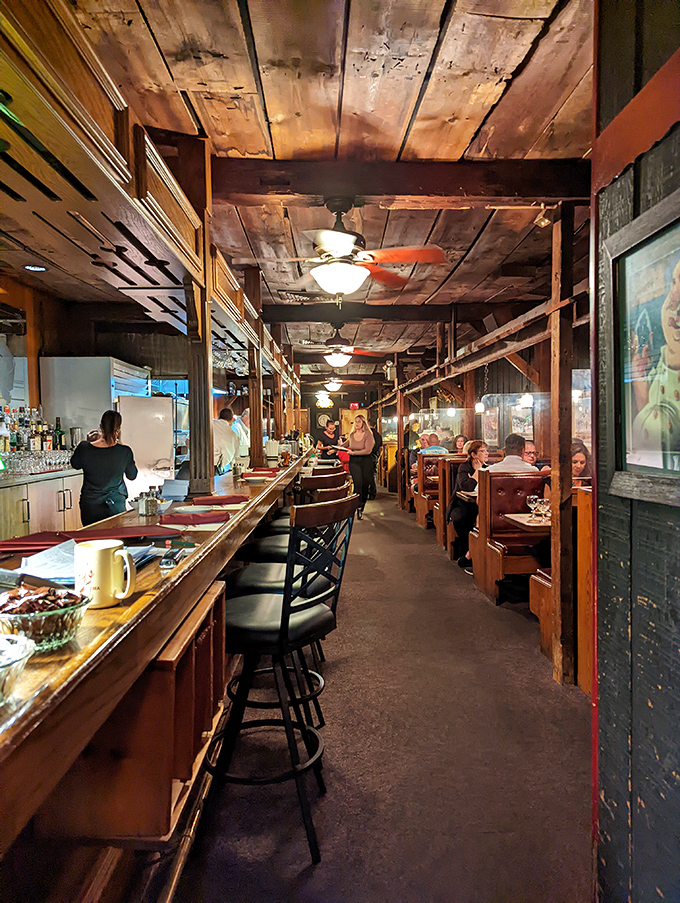 Step inside and you're transported to a world where rustic wooden beams and cozy booths set the stage for seafood magic to unfold.