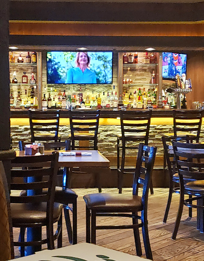 The bar area strikes that perfect balance&mdash;warm lighting, well-stocked shelves, and enough TVs to catch the Lions game without feeling like a sports bar.