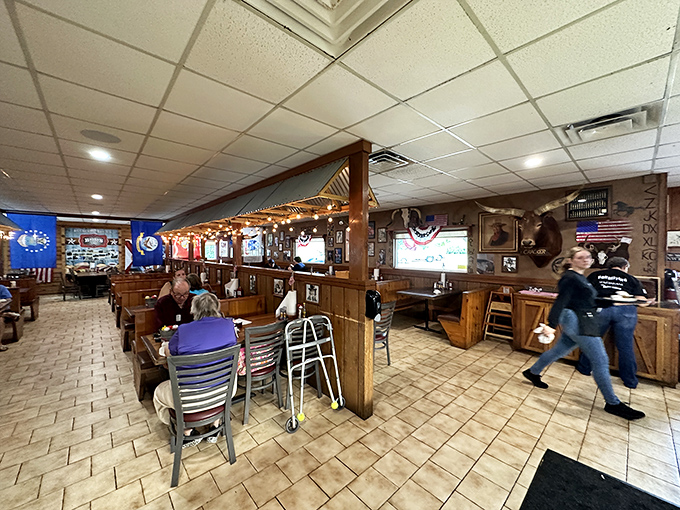 Where wood paneling meets mounted trophies, this isn't just a dining room&mdash;it's a museum of American BBQ culture.