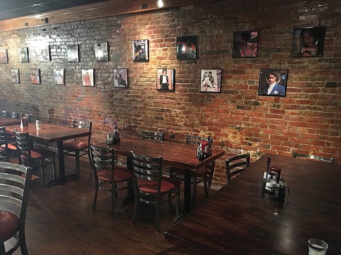 Exposed brick walls adorned with framed photographs create the perfect backdrop for soul food conversations that last long after dessert.