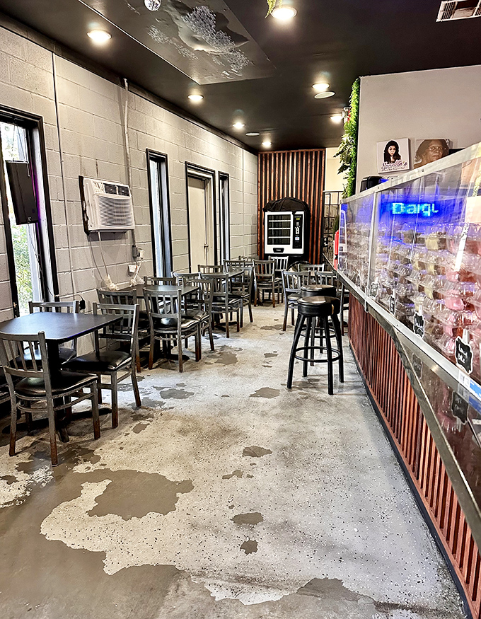 Industrial chic meets comfort food in a space where concrete floors and metal chairs surprisingly feel like home.