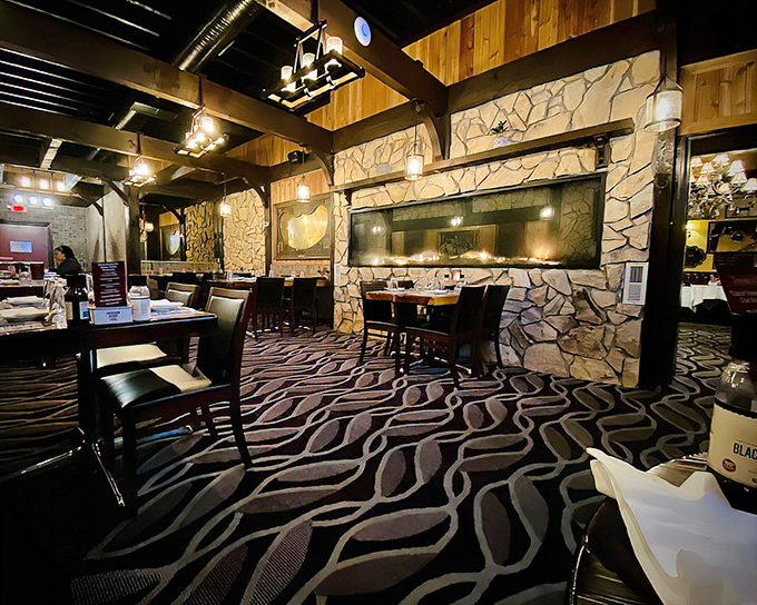 Step into a time capsule of classic steakhouse ambiance&mdash;stone walls, wooden beams, and that distinctive wavy carpet that somehow works perfectly. Dim lighting sets the mood for serious meat consumption.