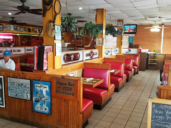 Classic Americana at its finest&mdash;red vinyl booths, wood paneling, and a "Please Wait for Your Hostess" sign that's been directing hungry patrons for decades.