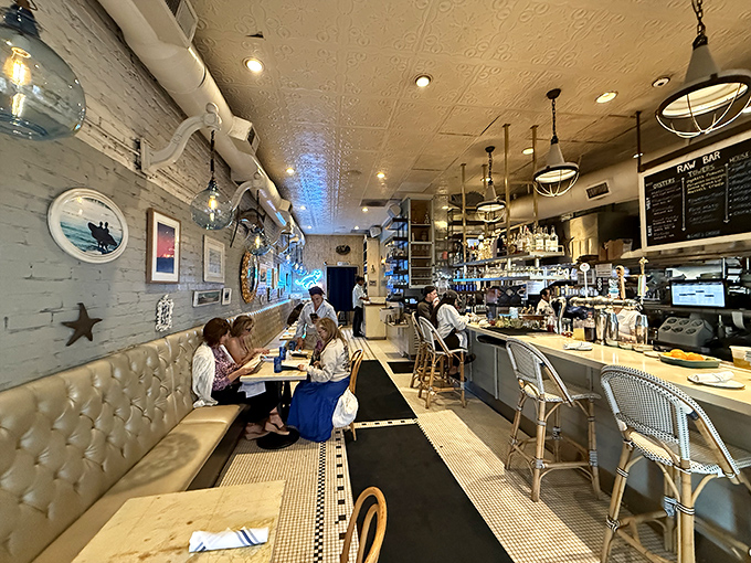 Inside, cream-colored tufted banquettes and nautical lighting create the perfect backdrop for seafood indulgence&mdash;like dining in a stylish captain's quarters.