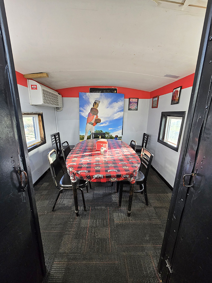 Private dining with Buckeye flair! This intimate train compartment offers the perfect spot to enjoy your meal while surrounded by scarlet and gray team spirit.
