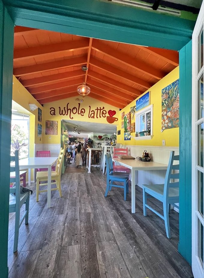 Color therapy in action! Step inside to a world where turquoise trim meets sunny yellow walls and mismatched chairs create the perfect Florida Keys vibe.