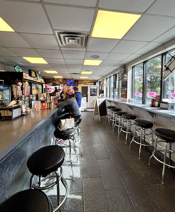 Counter culture at its finest&mdash;where spinning stools and fluorescent lighting set the stage for cheesesteak magic to unfold before your very eyes.