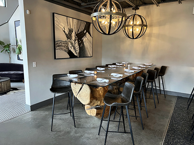 Clean lines and warm lighting create the perfect backdrop for serious comfort food conversations.