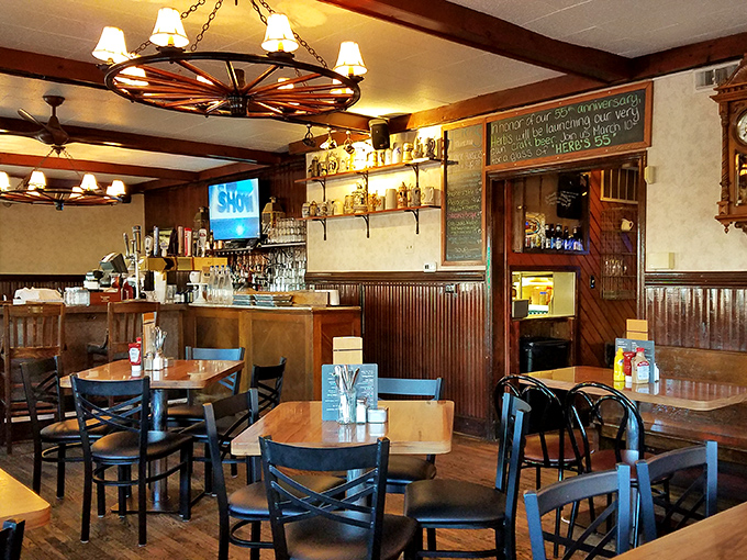 Step inside and time stands still&mdash;wagon wheel chandeliers, wooden paneling, and tables that have hosted countless conversations create that "everybody knows your name" vibe.