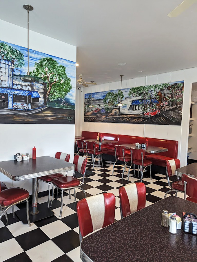 Classic Americana comes alive inside with checkerboard floors and cherry-red vinyl booths. Those murals aren't just decoration&mdash;they're visual appetizers for the feast to come.