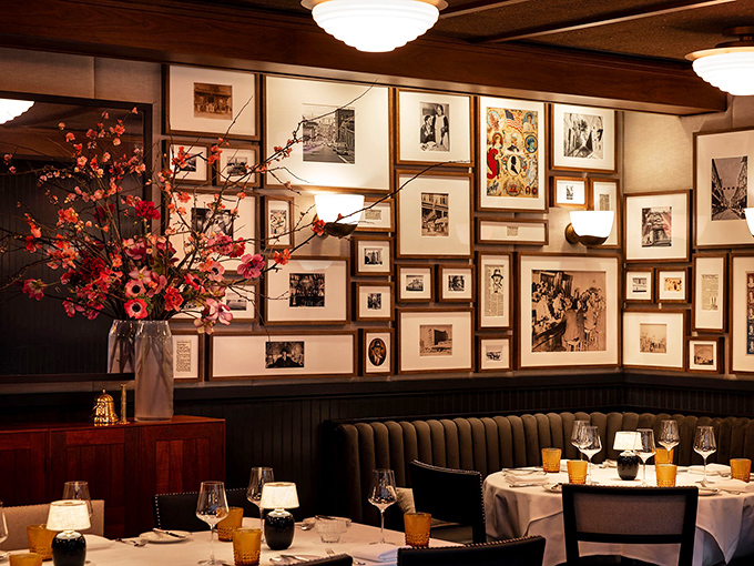 Classic steakhouse elegance meets neighborhood warmth, where every framed photo tells a story and every table promises magic.