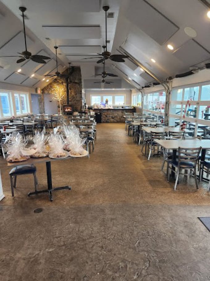 High ceilings, natural light, and that gorgeous stone fireplace create the perfect backdrop for seafood indulgence. Like a maritime cathedral dedicated to culinary bliss.