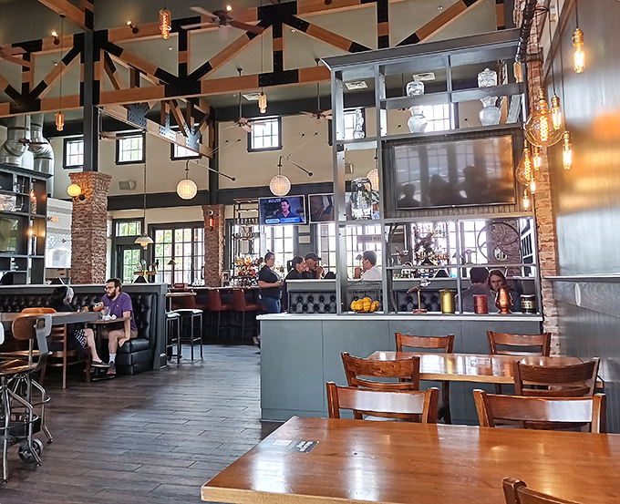 Industrial-chic meets cozy comfort in this thoughtfully designed space where exposed beams and Edison bulbs create the perfect backdrop for taco-induced euphoria.