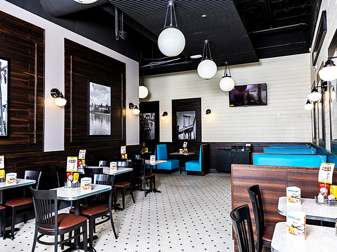 Inside, nostalgia meets modern comfort with classic deli aesthetics&mdash;black and white photos, pendant lighting, and booths that invite you to settle in for the long haul.