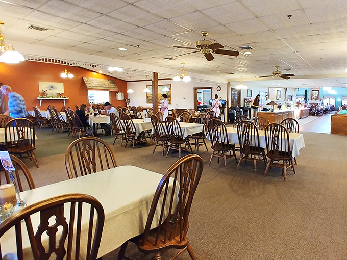 Wooden Windsor chairs and white tablecloths create that rare dining atmosphere where you feel both special and completely at home.