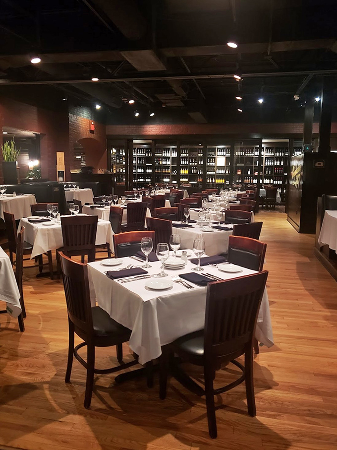 Classic black and white checkered floors meet vibrant red walls &ndash; the universal code for "good honest food served here."