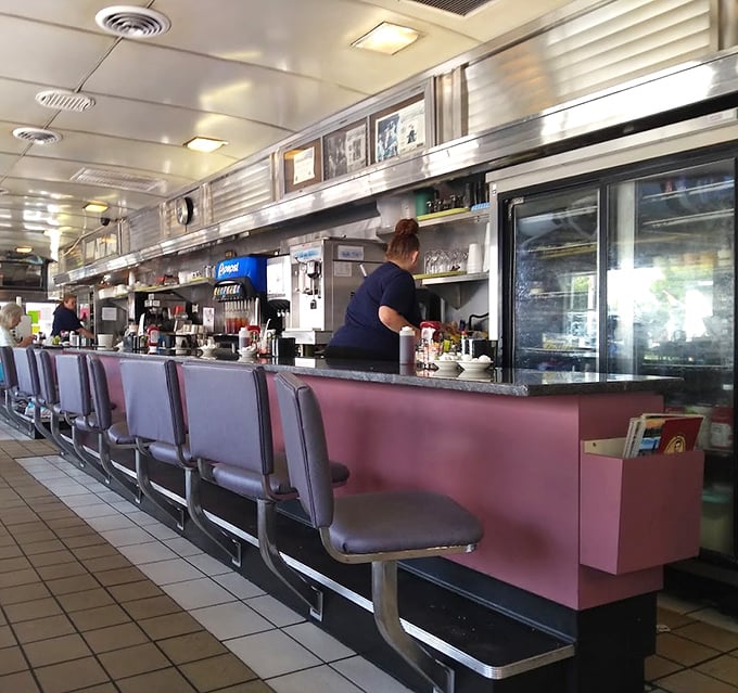 Wood paneling and burgundy booths tell stories of countless family gatherings. This isn't retro by design&mdash;it's authentic by survival.