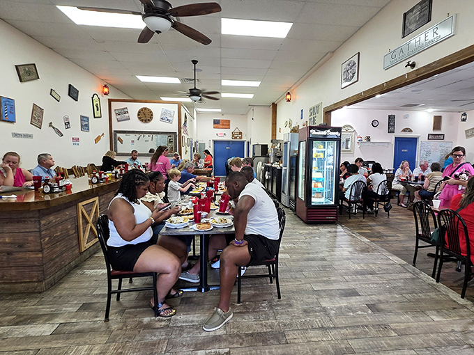 Ceiling fans spin lazily while Southern hospitality fills every corner of this cozy comfort food paradise.