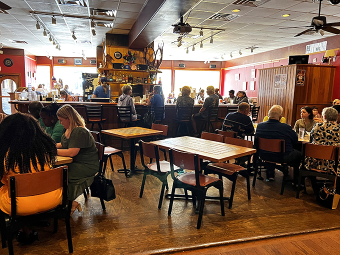 The warm, bustling interior buzzes with the energy of a place where everyone genuinely enjoys being there.