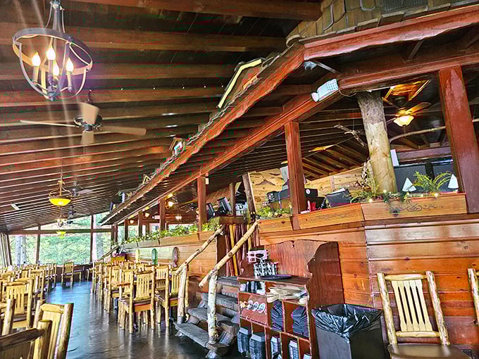 Timber beams and natural wood create a dining room that feels like a luxurious treehouse for grown-ups with impeccable taste.