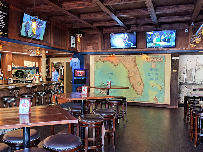 Wooden beams, nautical touches, and that magnificent Florida map create the perfect backdrop for serious eating and casual conversation.