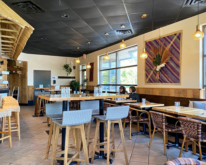 Bamboo-topped bar meets modern design in this inviting space. Like a tropical getaway without the 18-hour flight or awkward tan lines.