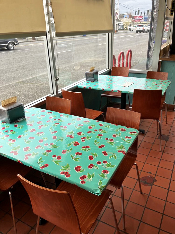Cherry-patterned oilcloths transform simple tables into nostalgic time machines. Like sitting in your favorite aunt's kitchen, if your aunt happened to be a barbecue genius.