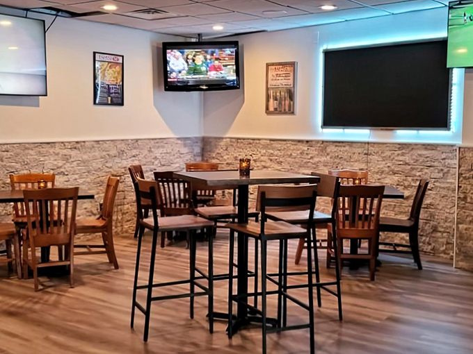 Sports memorabilia meets comfortable dining where every seat offers perfect game-watching angles and conversation-friendly acoustics.